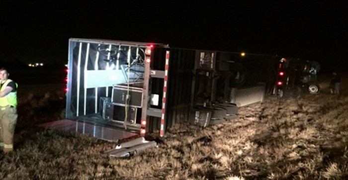 Truck Hauling Equipment For Popular Rock Bands Overturns While Trying ...