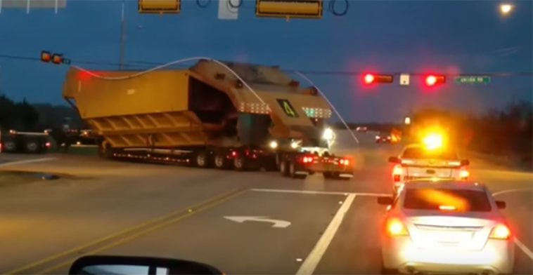 Watch: Here's How An Oversize Load Gets Past Low-Hanging Traffic Lights